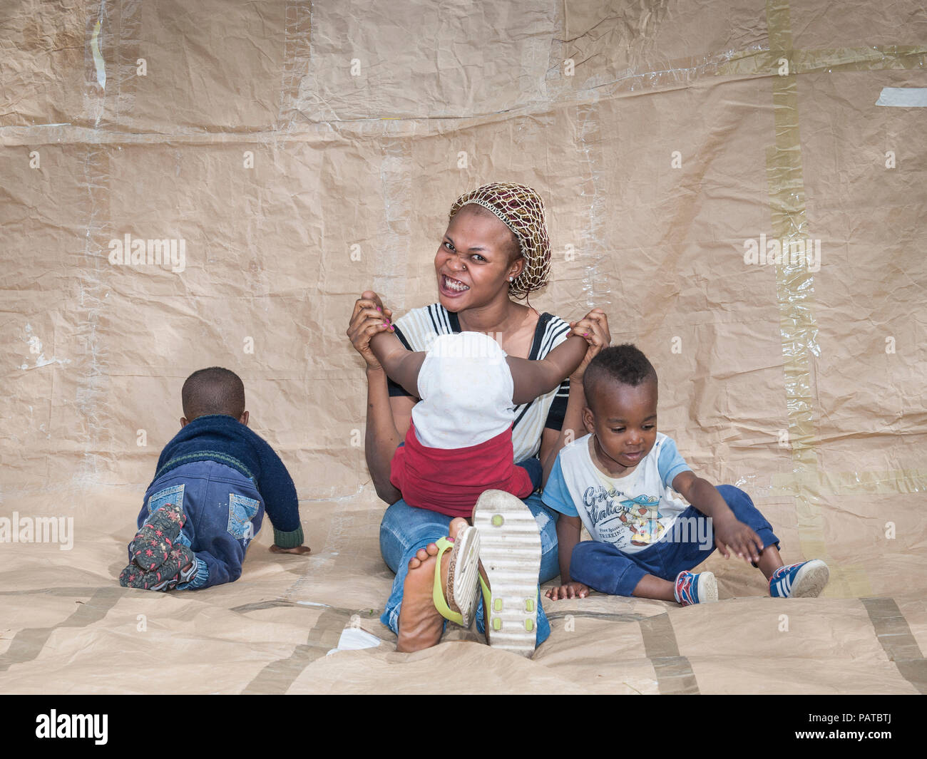 Italy, Cozzo, fleeing families Stock Photo - Alamy