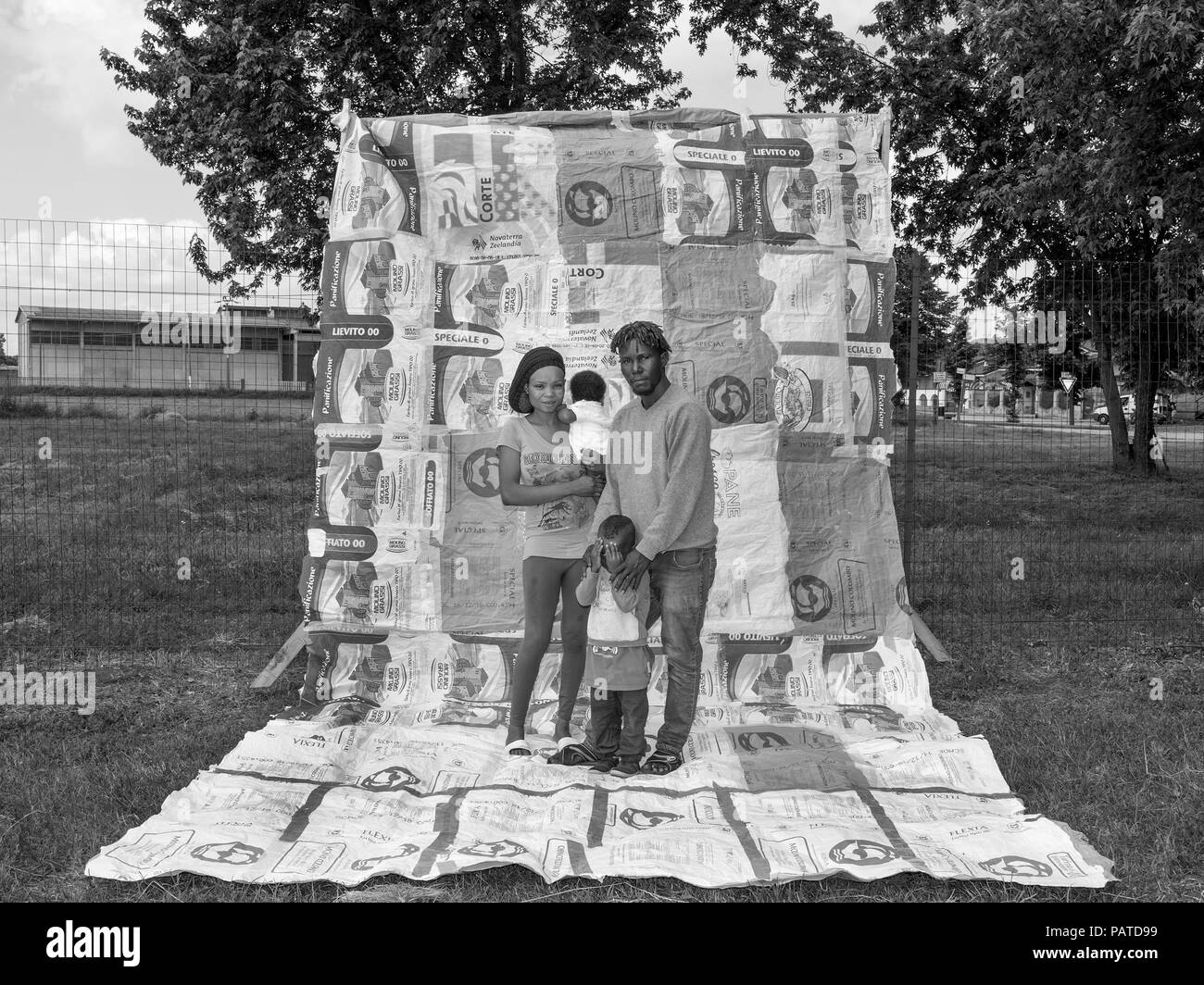Italy, Cozzo, fleeing families Stock Photo - Alamy