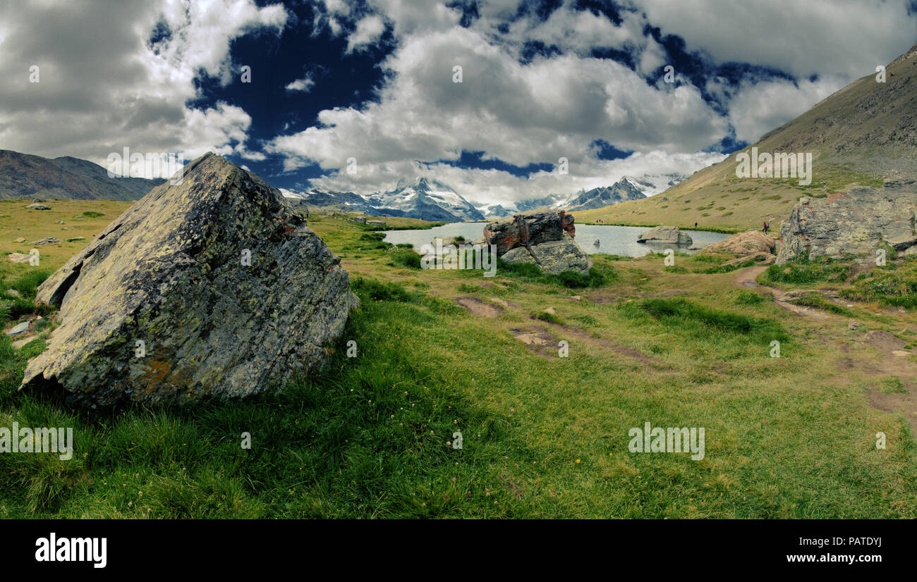 The Stellisee and iconic peak of the Matterhorn in the Swiss canton of ...