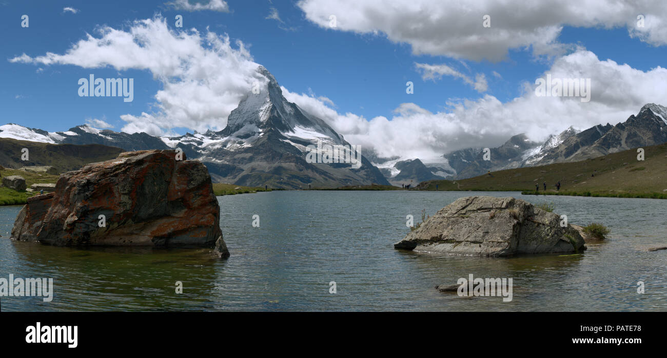 The Stellisee and iconic peak of the Matterhorn in the Swiss canton of ...