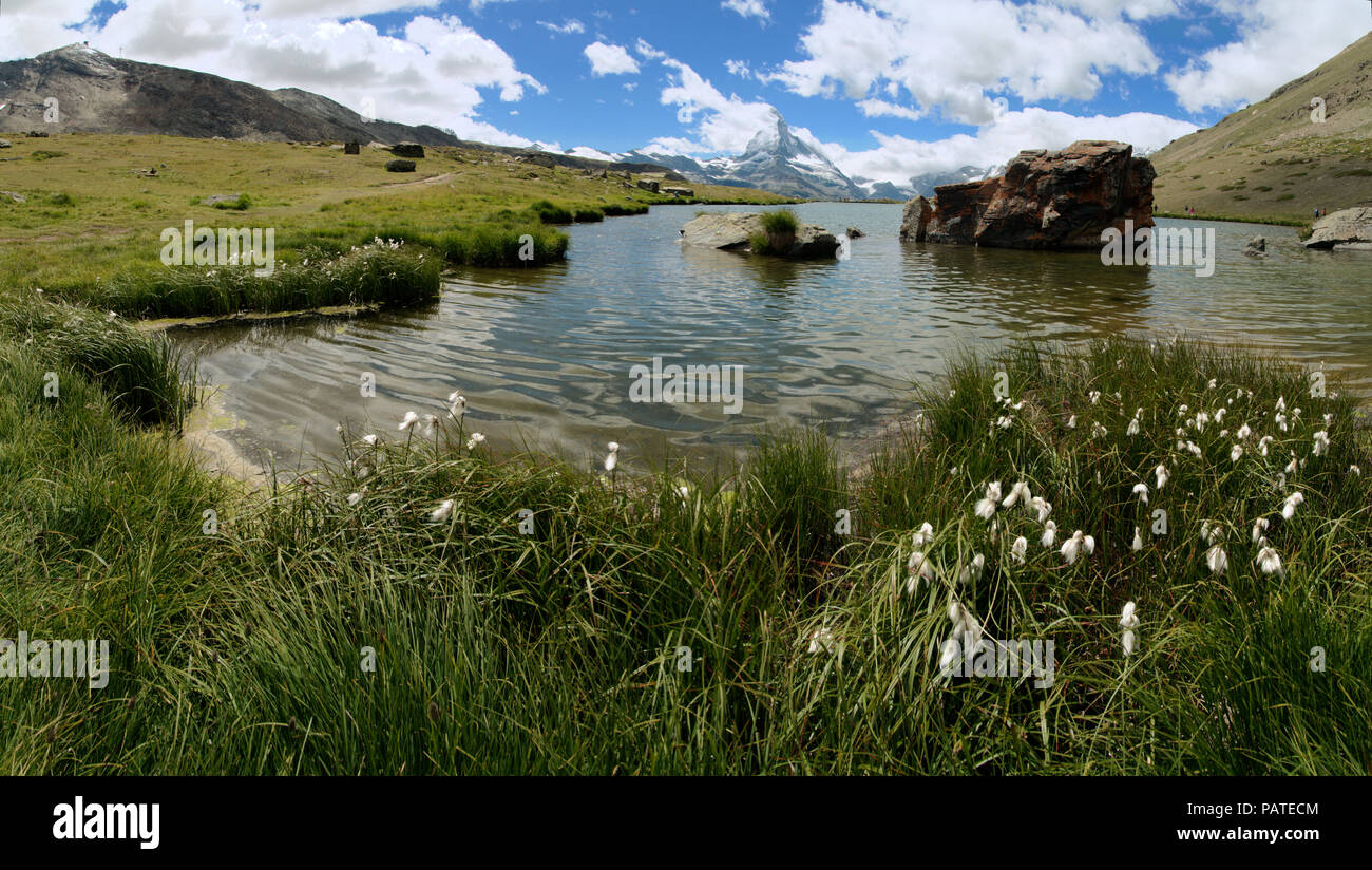 The Stellisee and iconic peak of the Matterhorn in the Swiss canton of ...