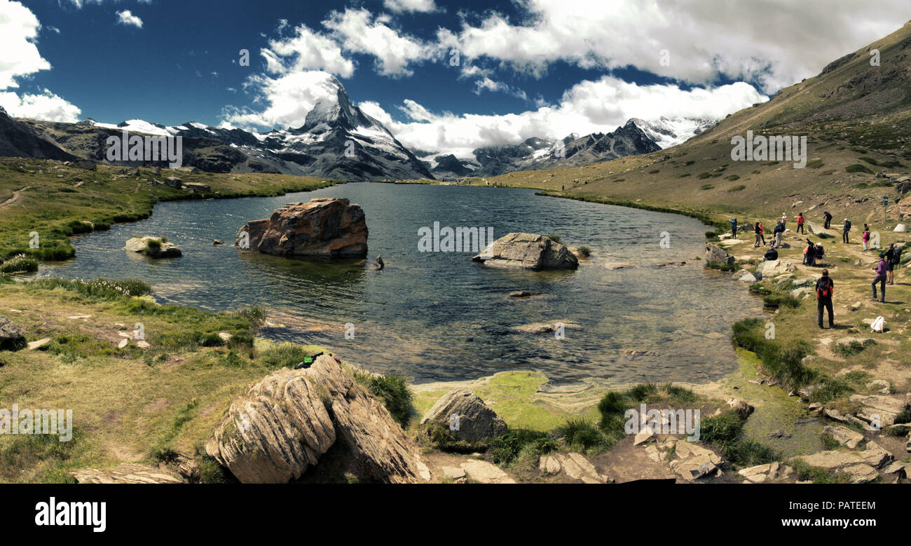 The Stellisee and iconic peak of the Matterhorn in the Swiss canton of ...