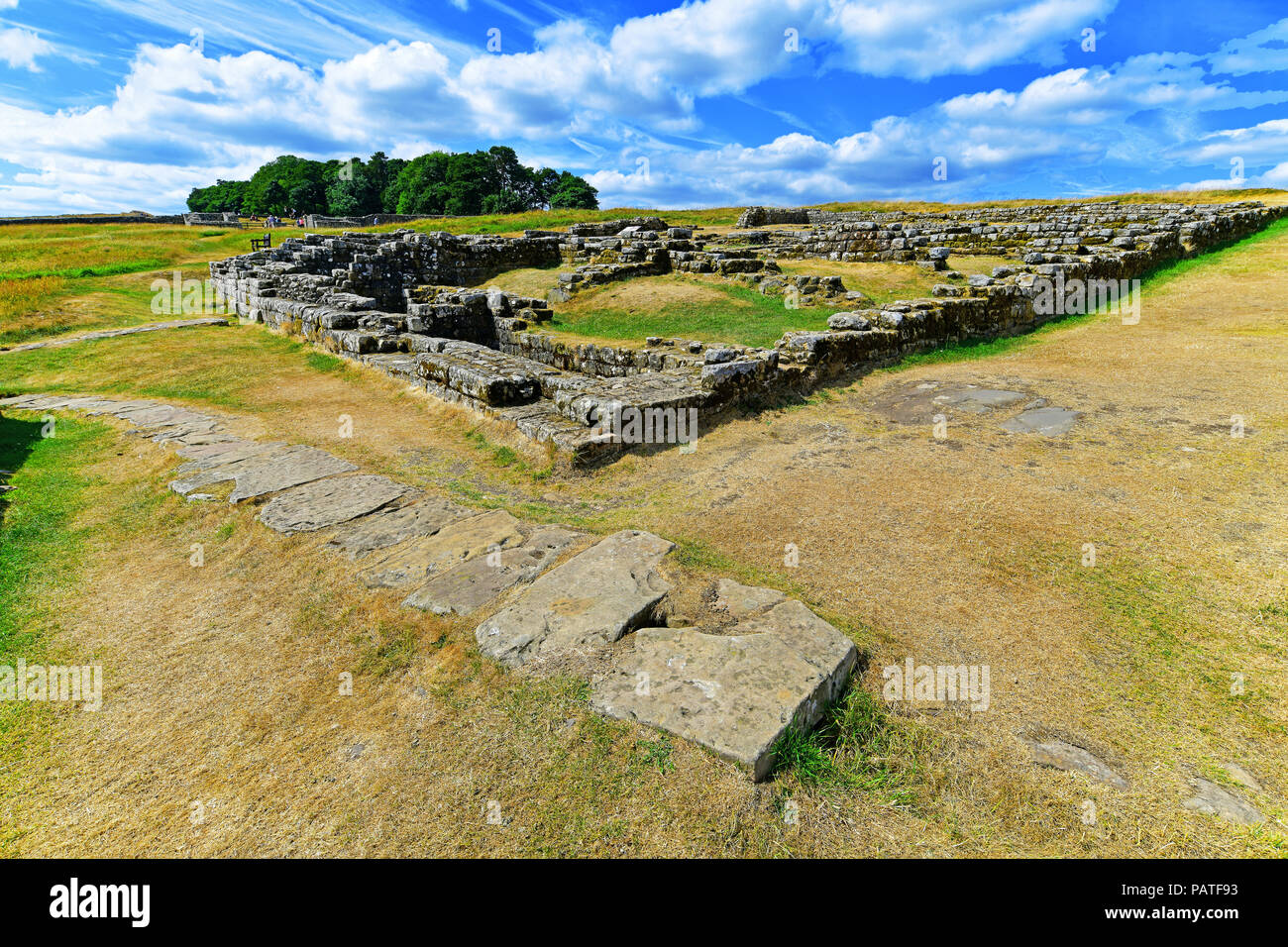 Housesteads Roman Fort corner living quarters with blue sky and white ...