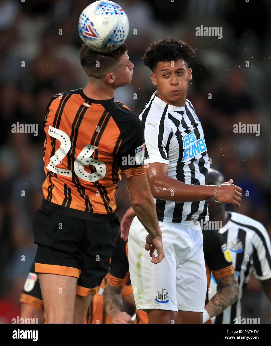 Hull City's Reece Burke (left) and Newcastle United's Jacob Murphy ...