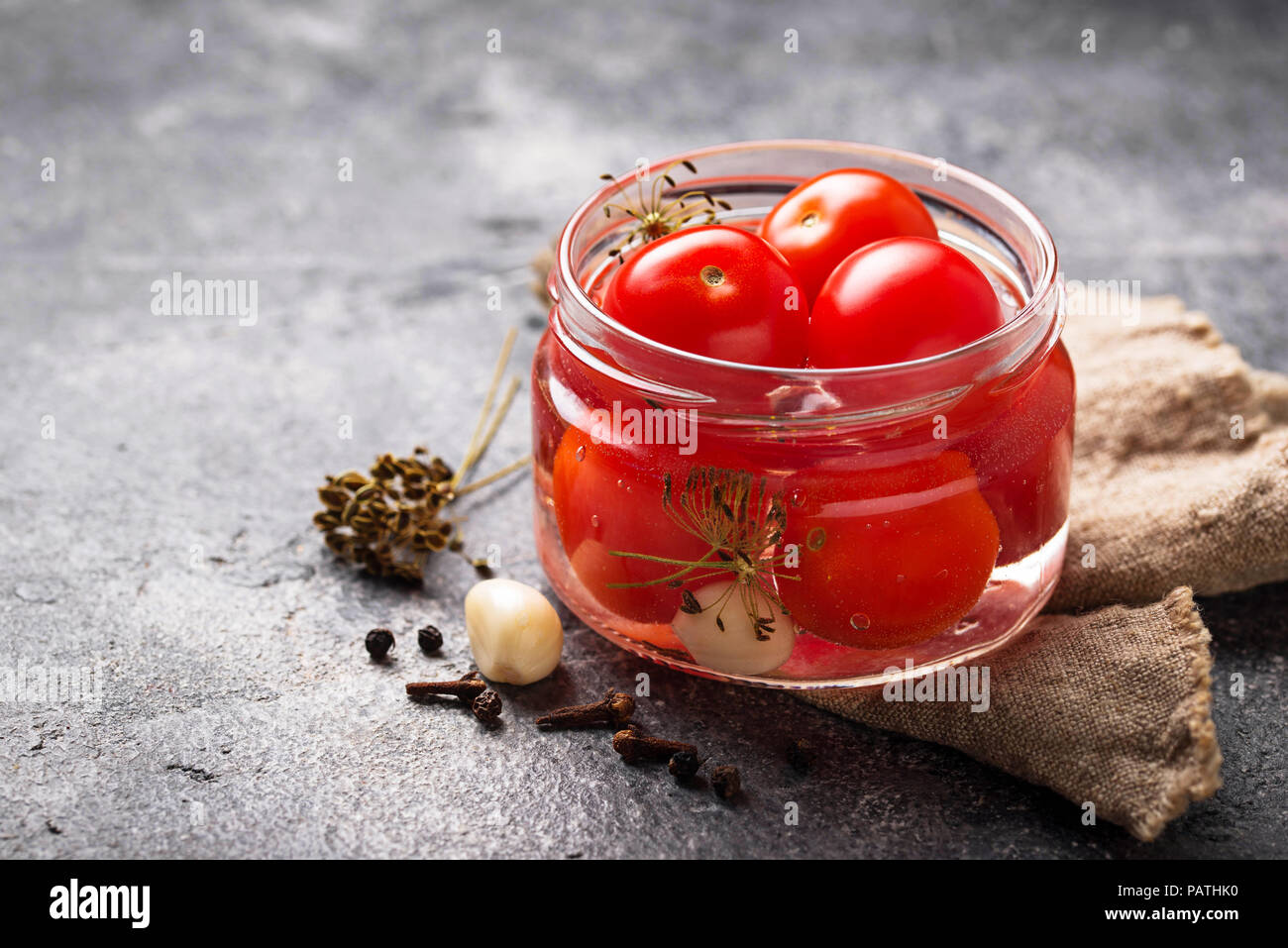 Homemade pickled cherry tomato Stock Photo - Alamy
