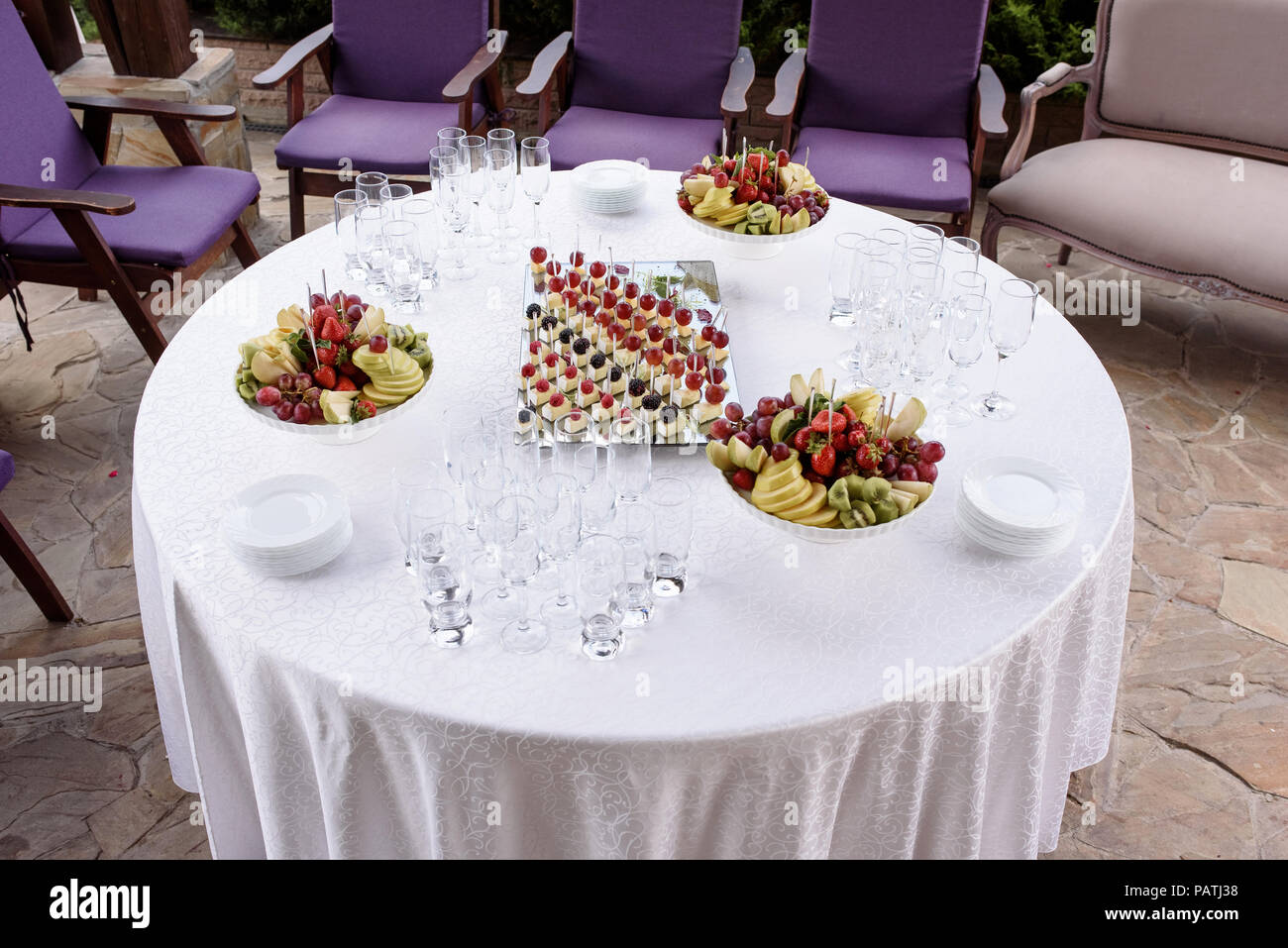 Round table with beautiful snack Stock Photo - Alamy