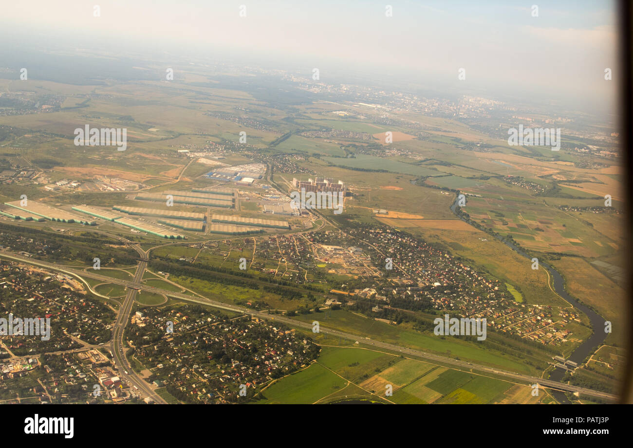 An aerial view from an airplane in the sky and on the city Stock Photo ...