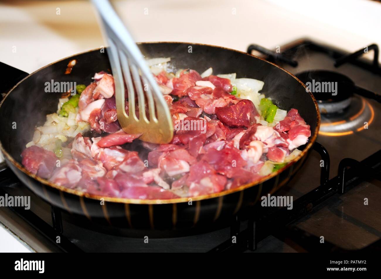 Cooking lamb meat Stock Photo - Alamy