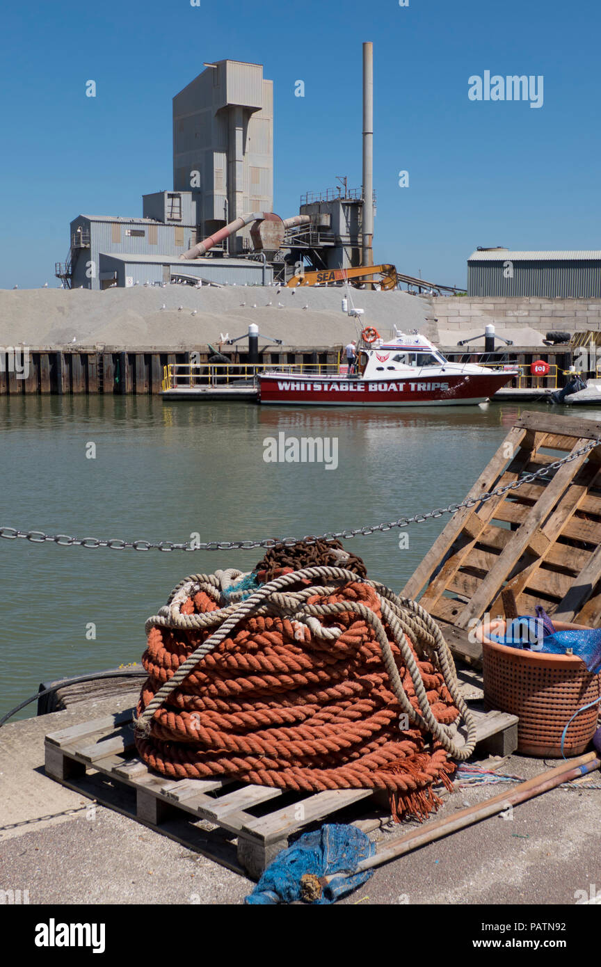 Fishing boats and factory at Whistable harbour, Kent,England,UK Stock ...