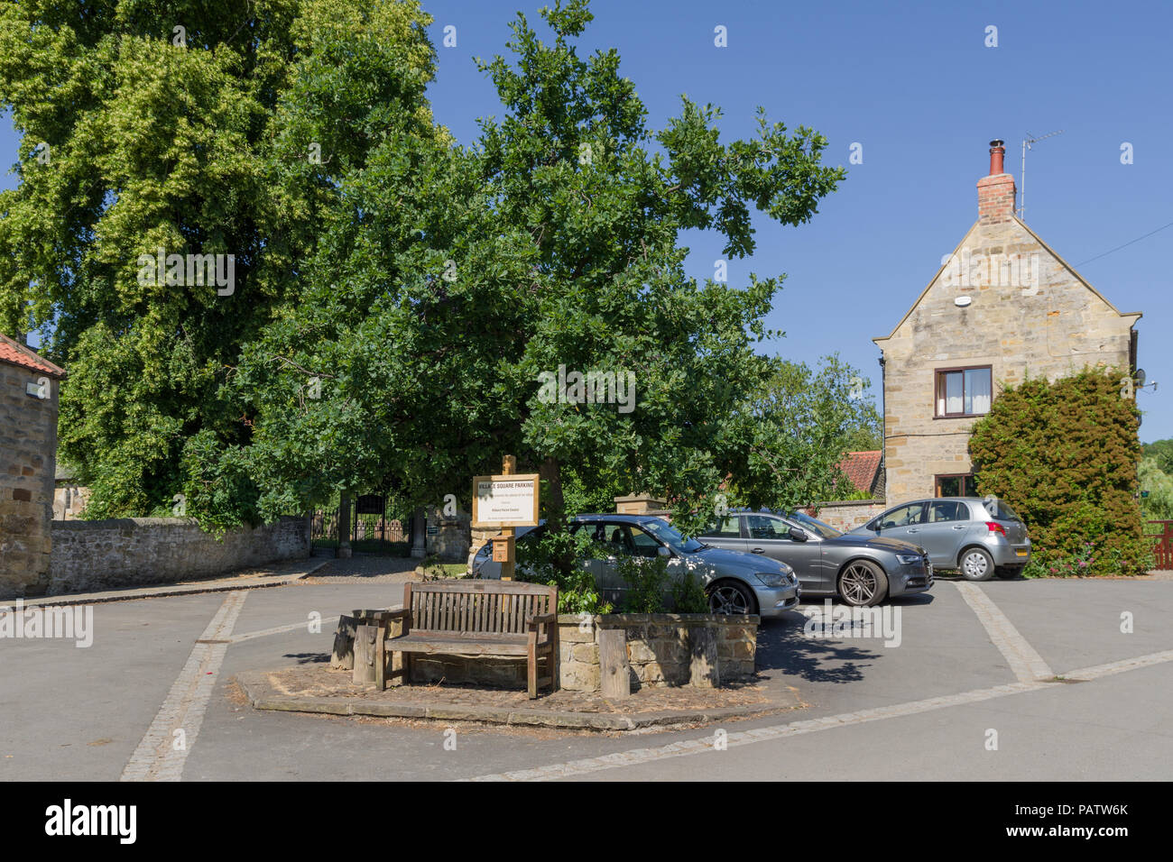 The village square in the pretty North Yorkshire village of Kilburn ...