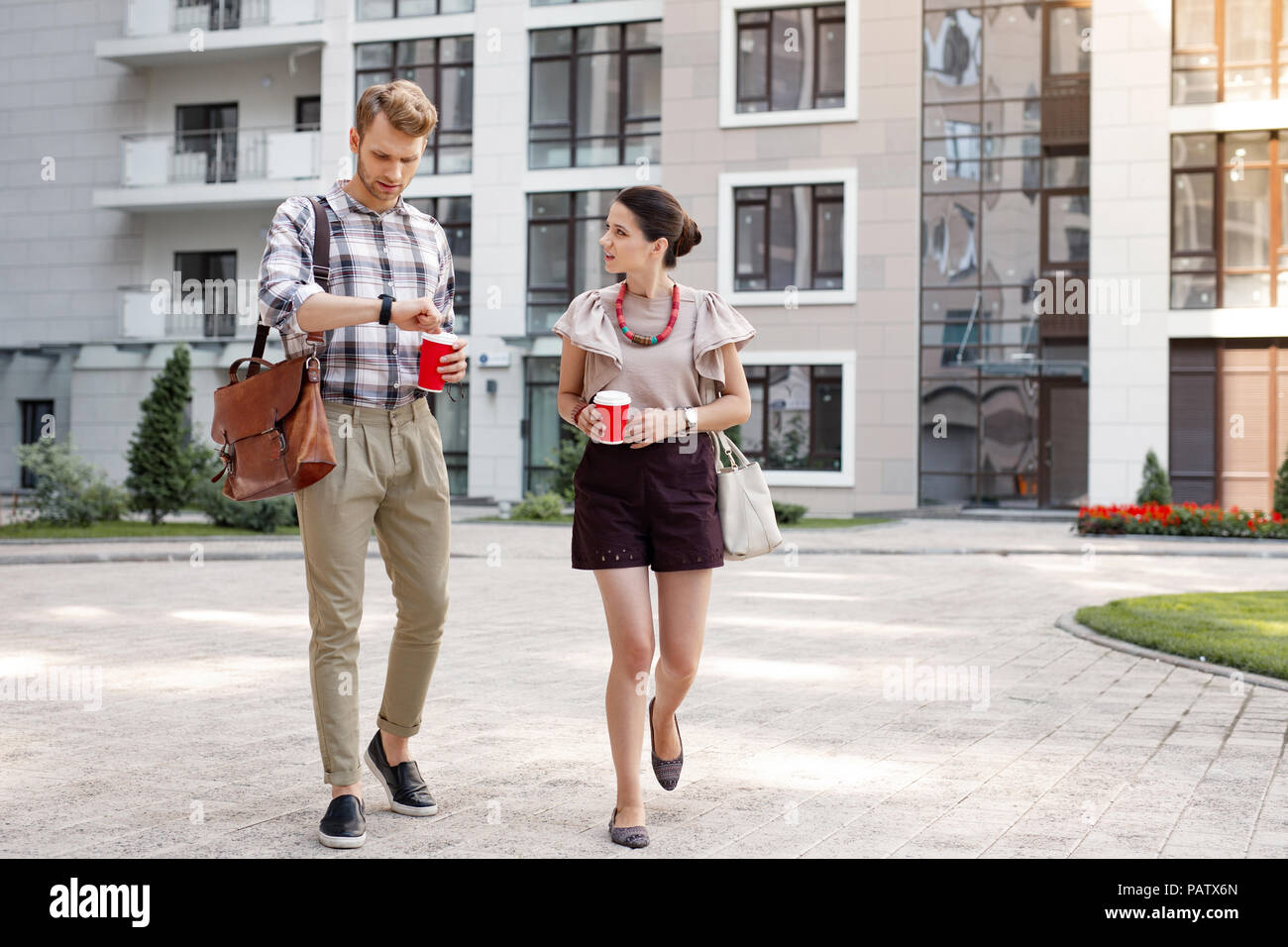 Pleasant young people having a walk Stock Photo - Alamy