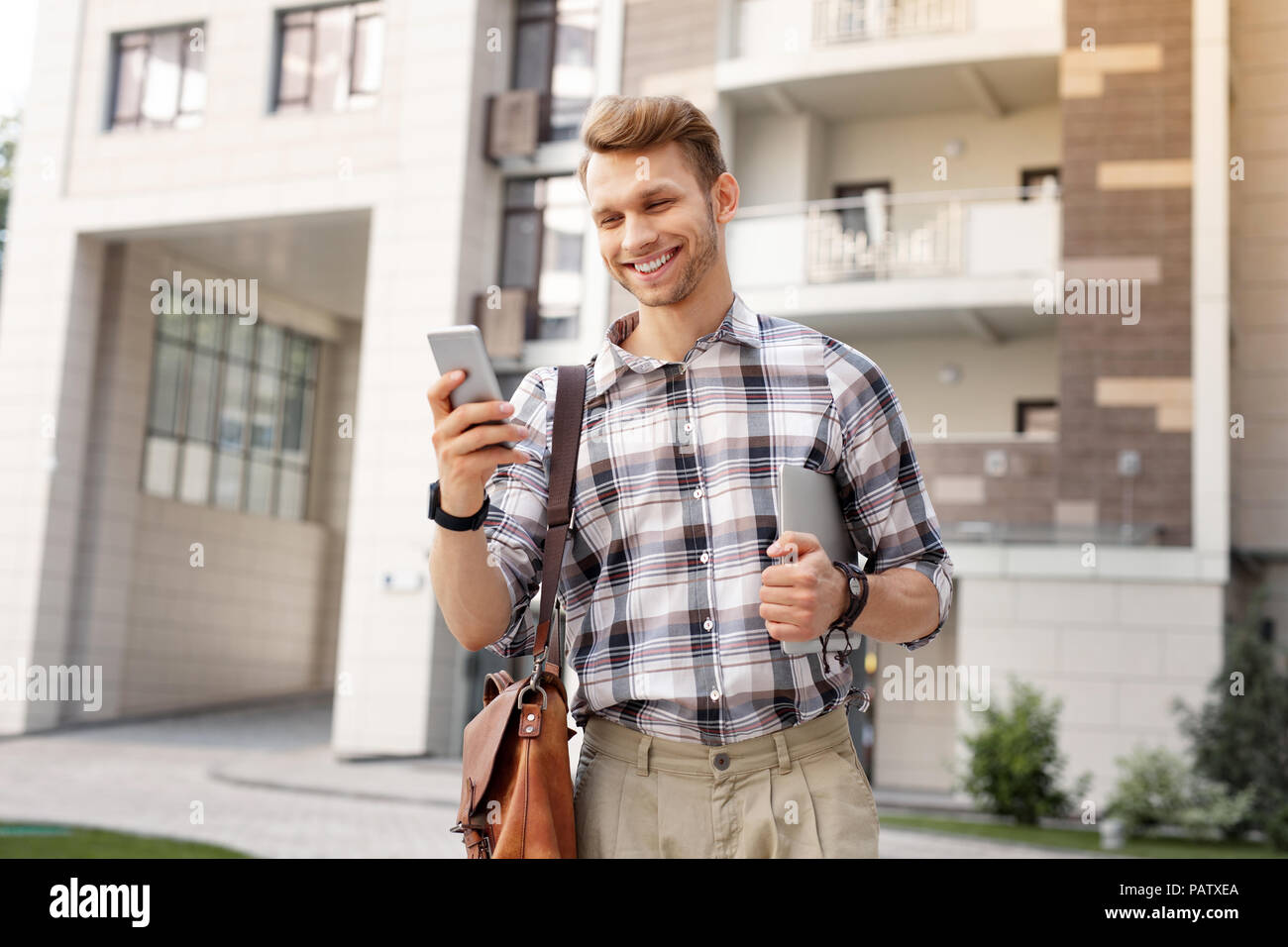 Happy nice man smiling Stock Photo - Alamy