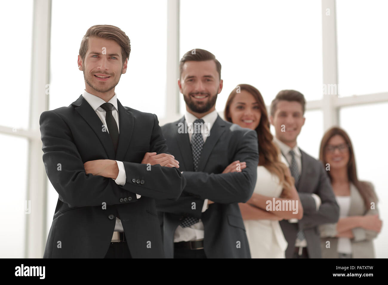 company employees standing together Stock Photo - Alamy