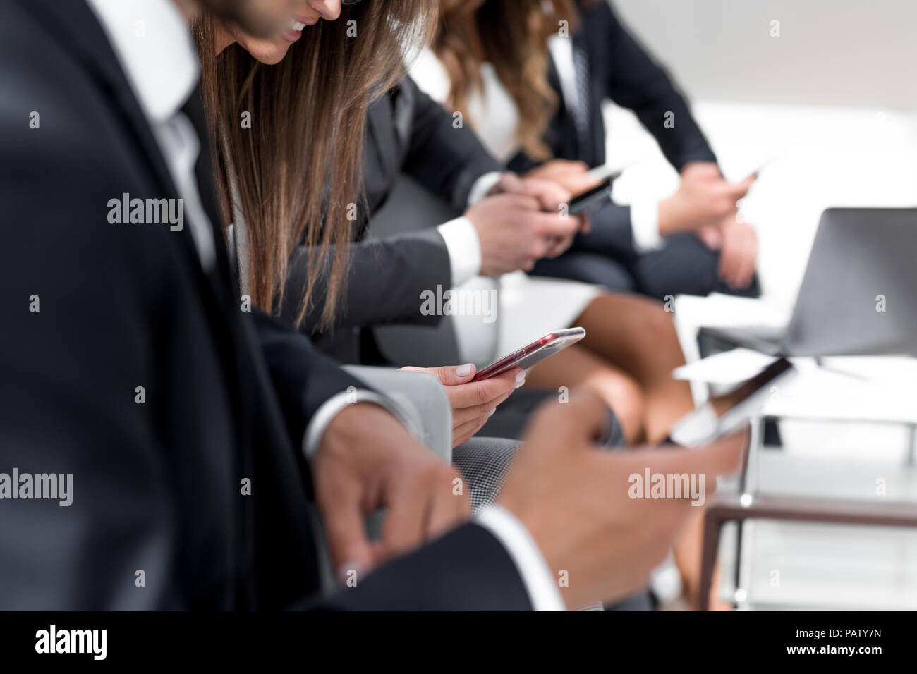 Many people using smart devices hi-res stock photography and images - Alamy