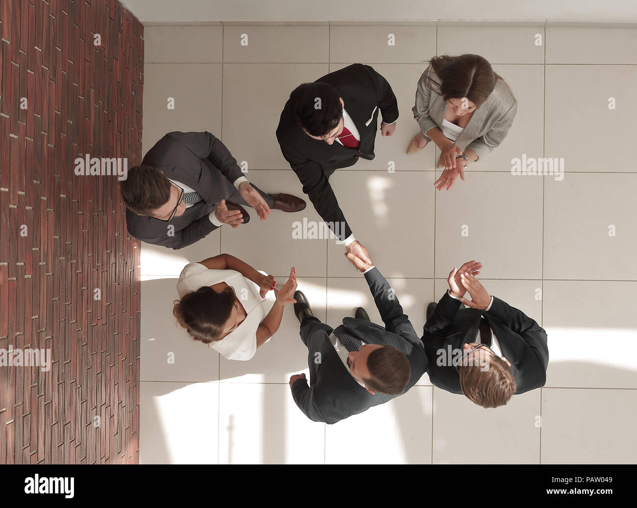 top view.meeting business partners and handshake Stock Photo - Alamy
