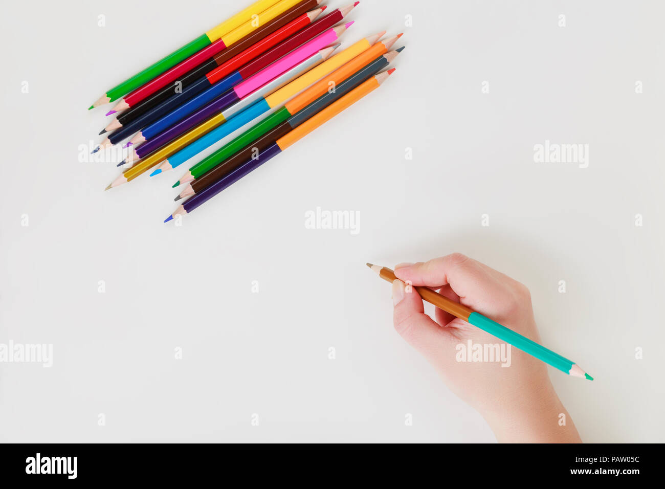 hand drawing with color double-sided pencils on white background Stock ...
