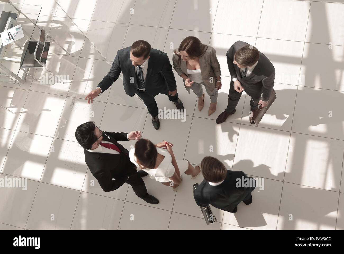 top view. employees discussing important issue Stock Photo - Alamy