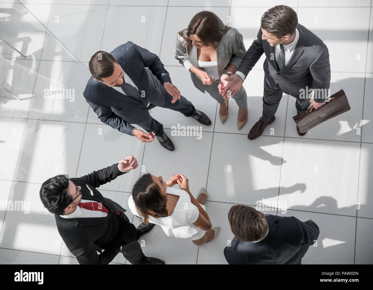 top view. employees discussing important issue Stock Photo - Alamy