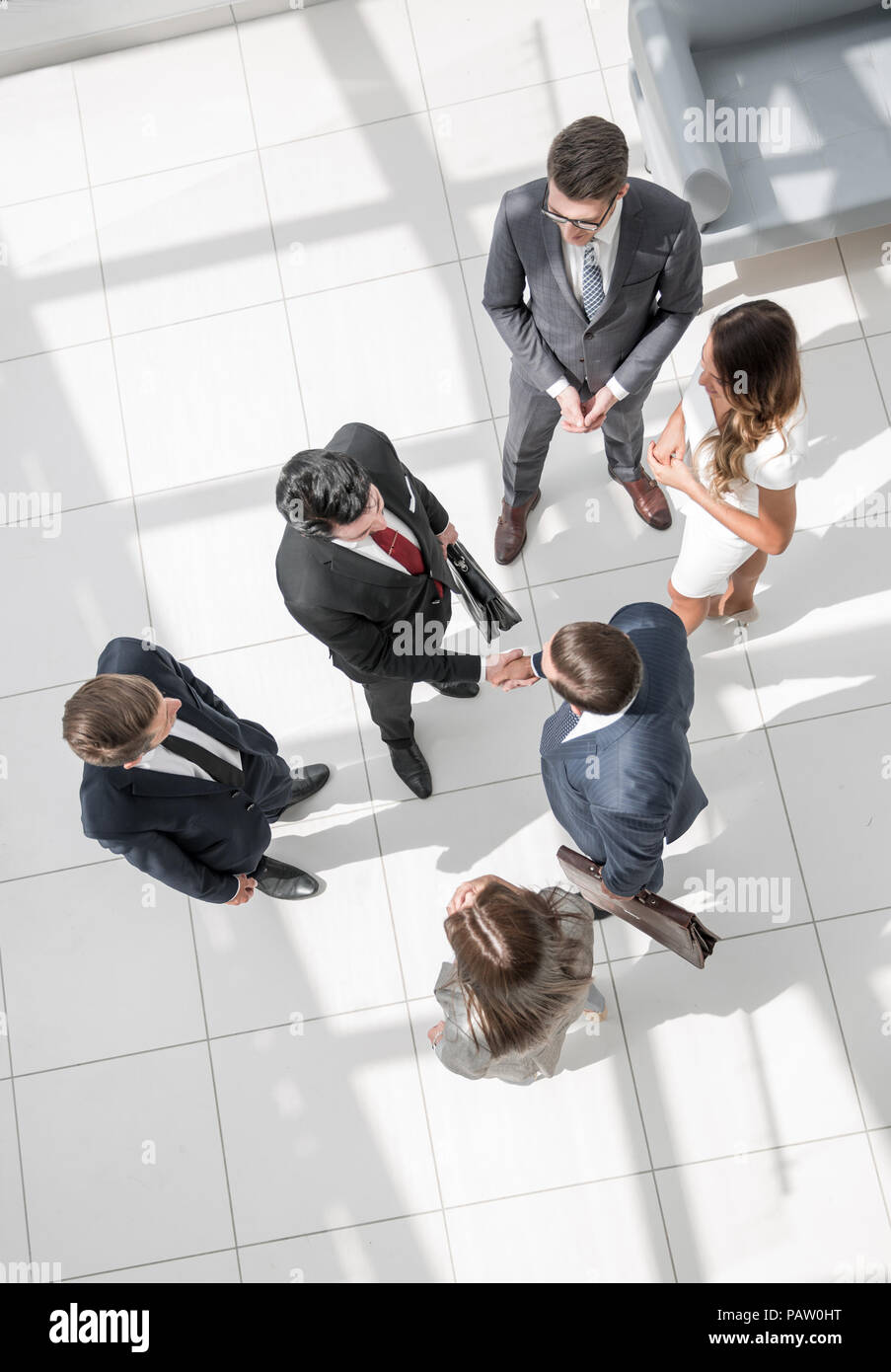 top view. handshake business partners at the meeting Stock Photo - Alamy