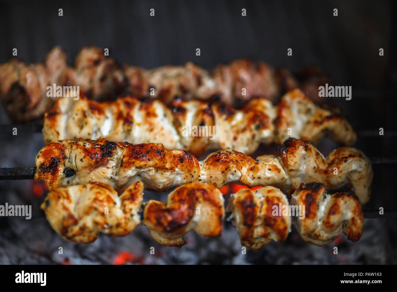 meat is roasted on the fire in the grill. BBQ, barbecue Stock Photo - Alamy