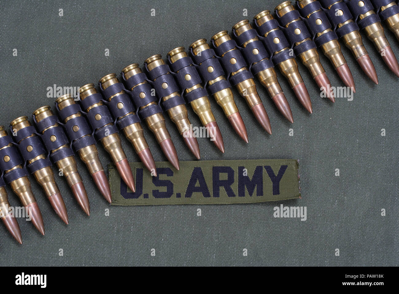 ammunition belt on US ARMY uniform background Stock Photo - Alamy