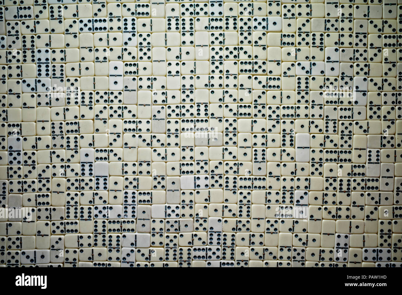 Wall decorated with domino pieces Stock Photo - Alamy