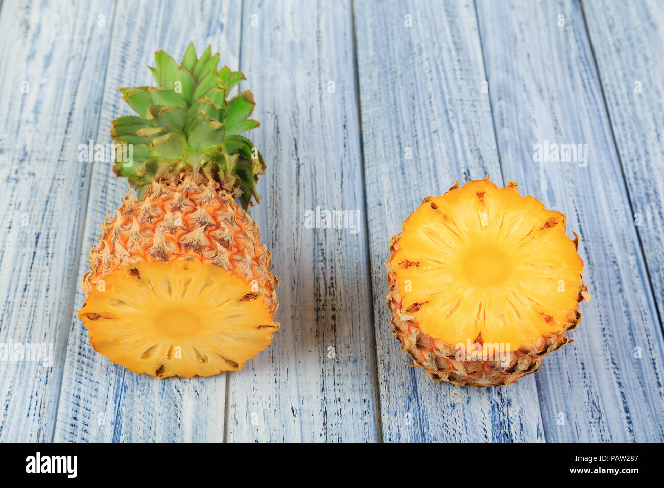 Fresh pineapple cut halves hi-res stock photography and images - Alamy