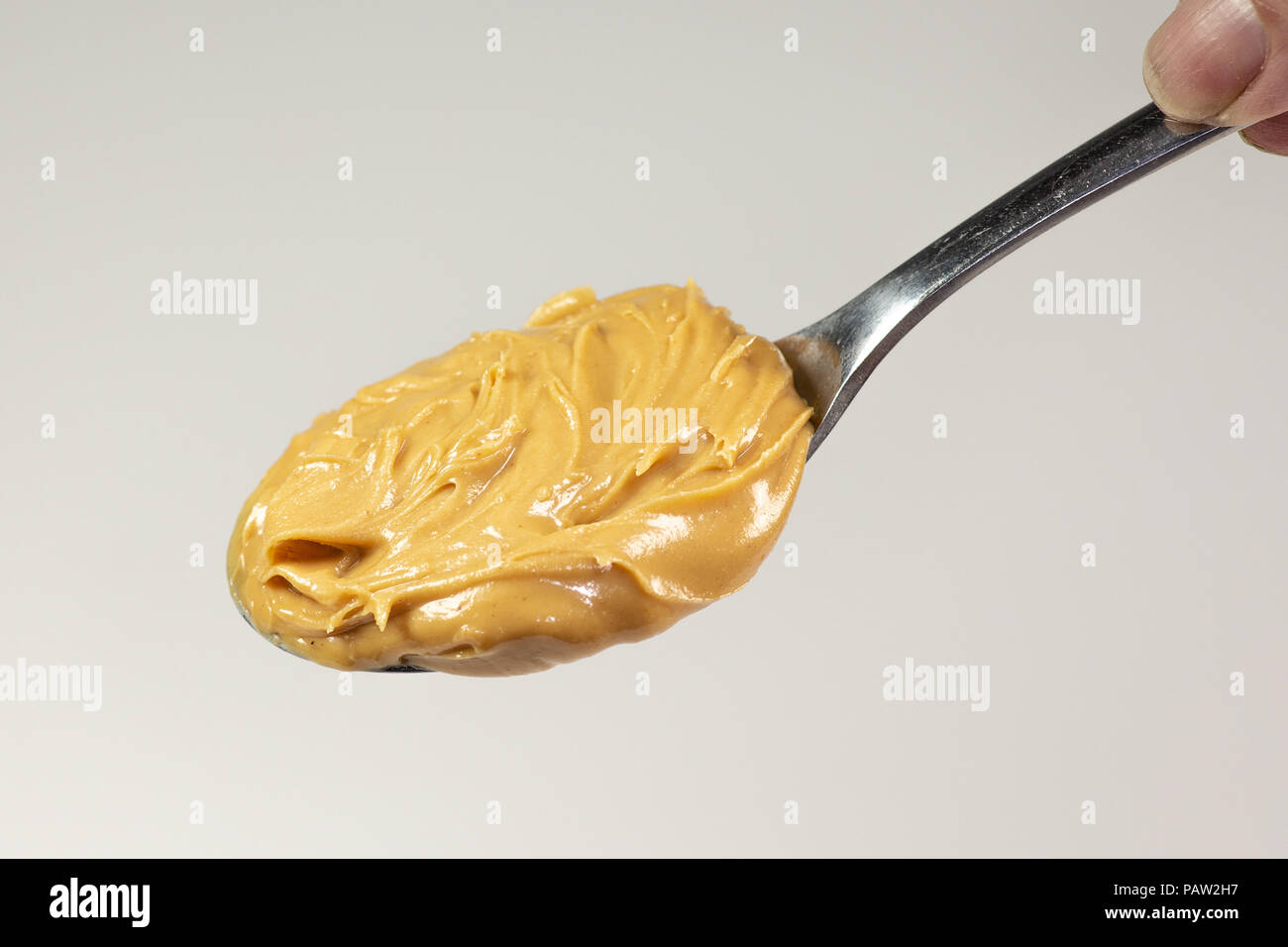 Smooth peanut butter spoon hi-res stock photography and images - Alamy