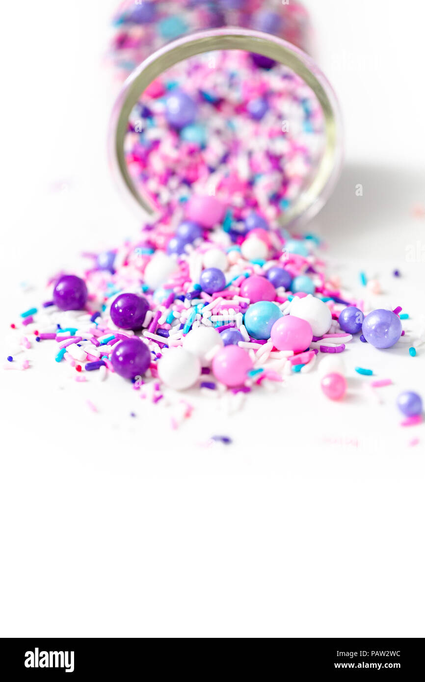 Colorful purple sprinkle blend on a white background Stock Photo - Alamy