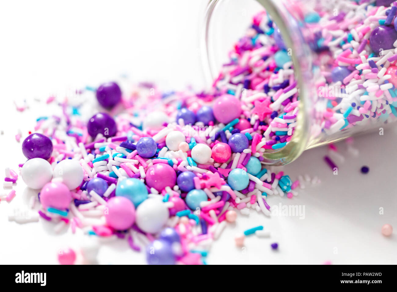 Colorful purple sprinkle blend on a white background Stock Photo - Alamy