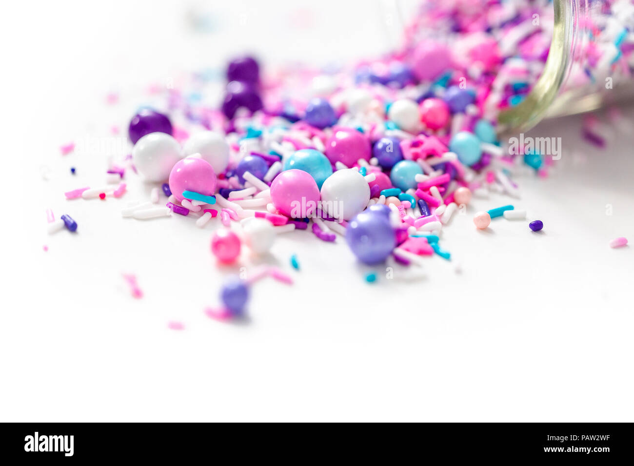 Colorful purple sprinkle blend on a white background Stock Photo - Alamy