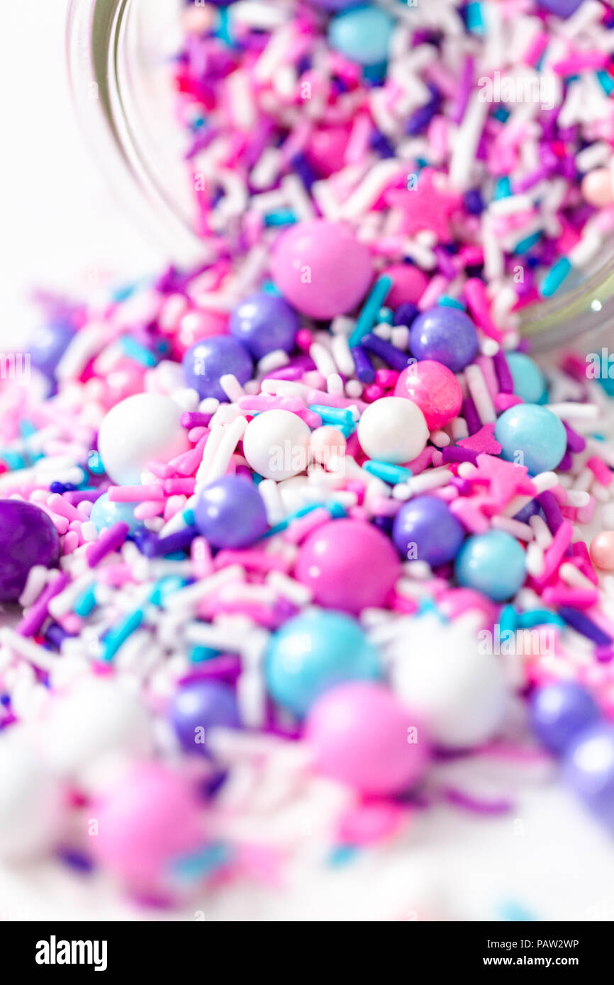 Colorful purple sprinkle blend on a white background Stock Photo - Alamy