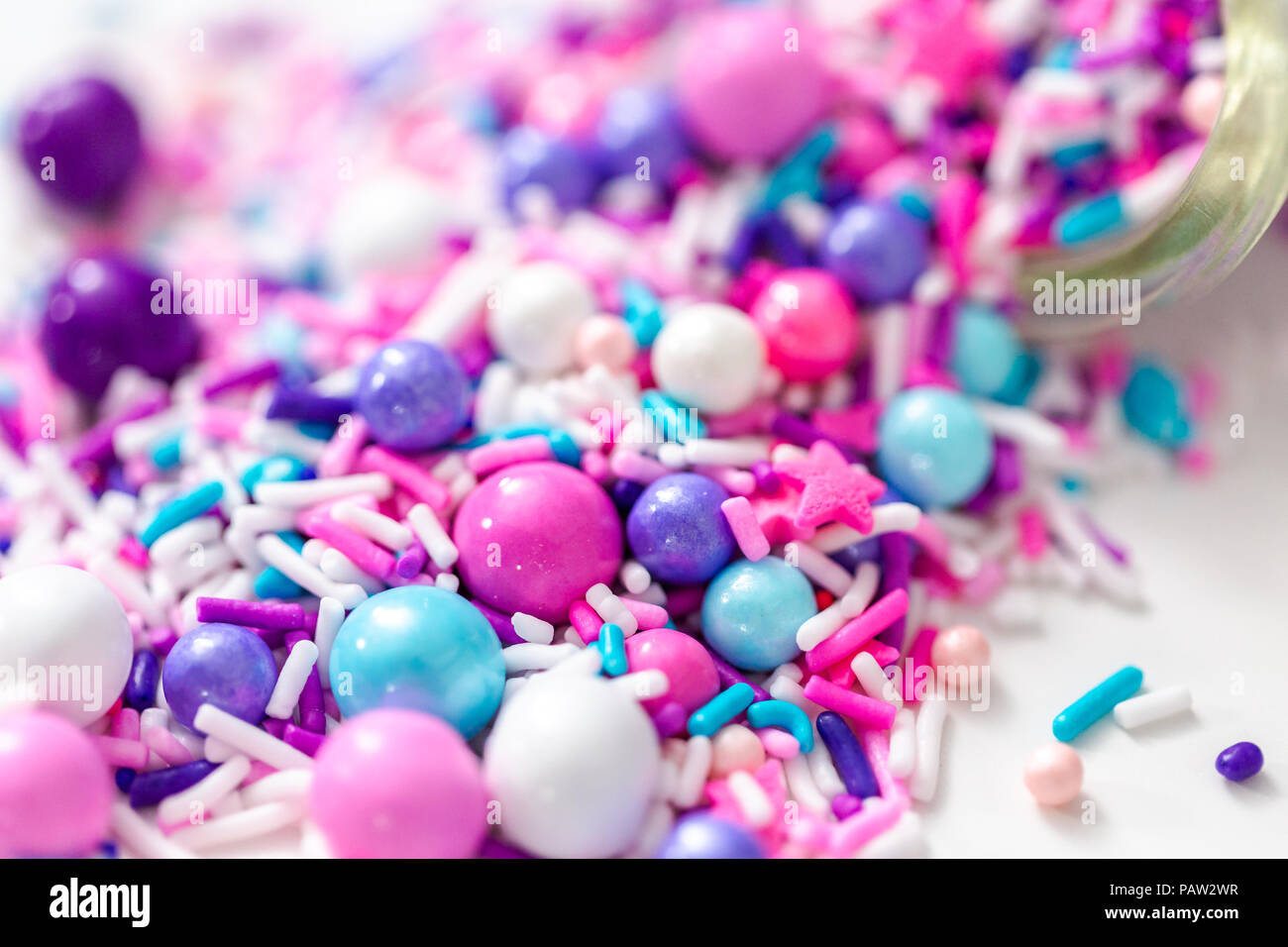 Colorful purple sprinkle blend on a white background Stock Photo - Alamy