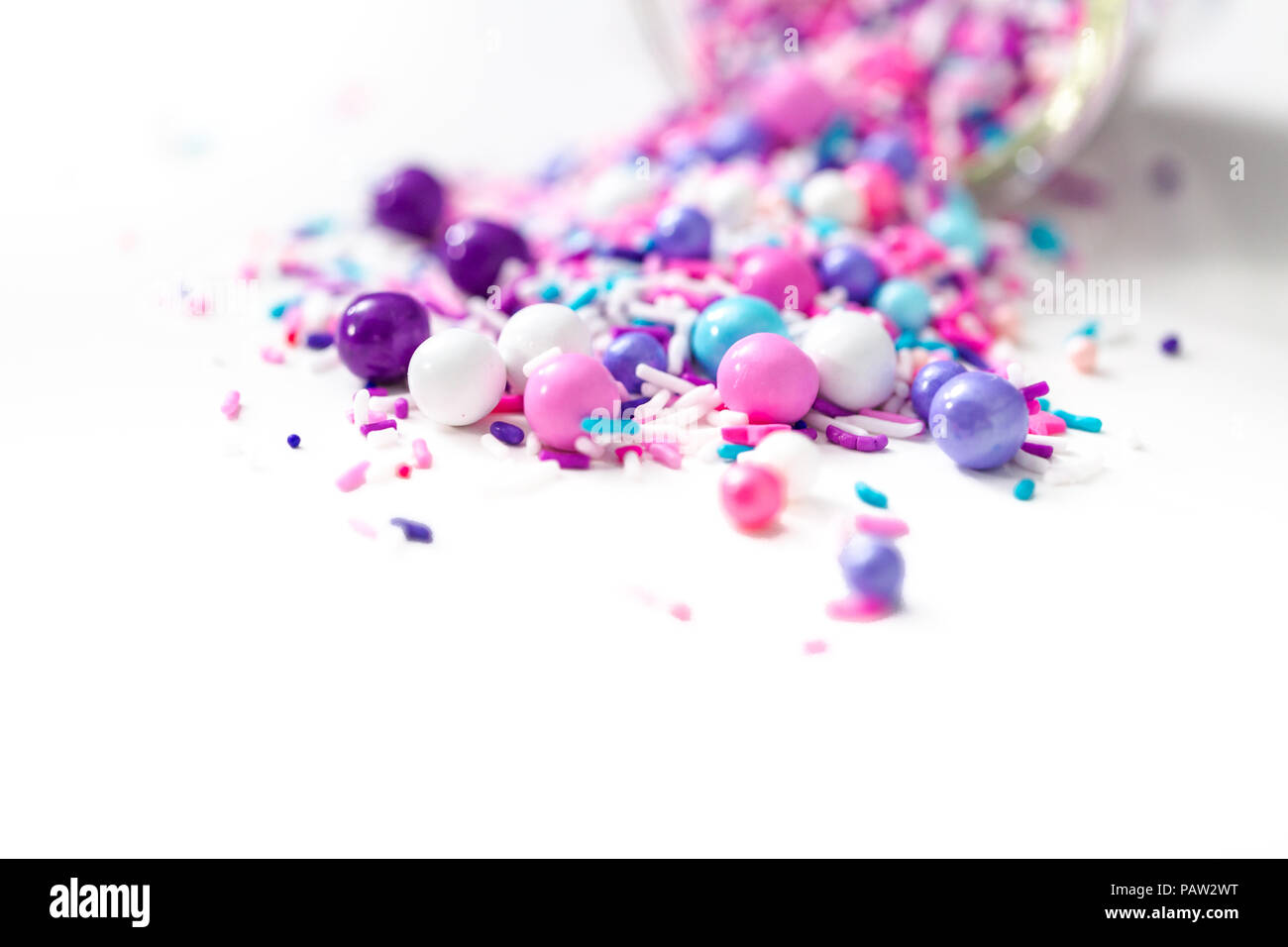 Colorful purple sprinkle blend on a white background Stock Photo - Alamy
