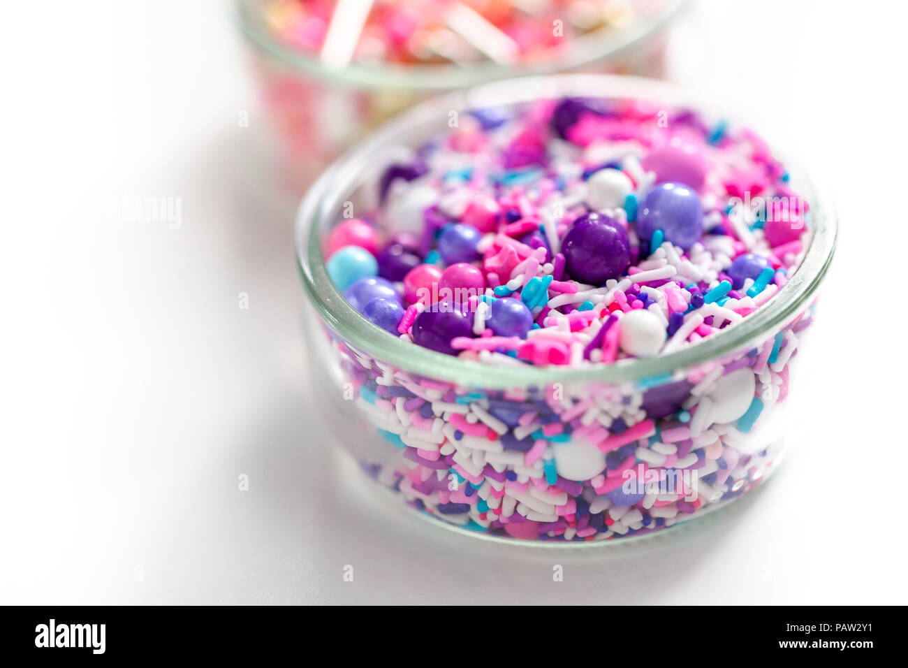 Colorful purple sprinkle blend on a white background Stock Photo - Alamy