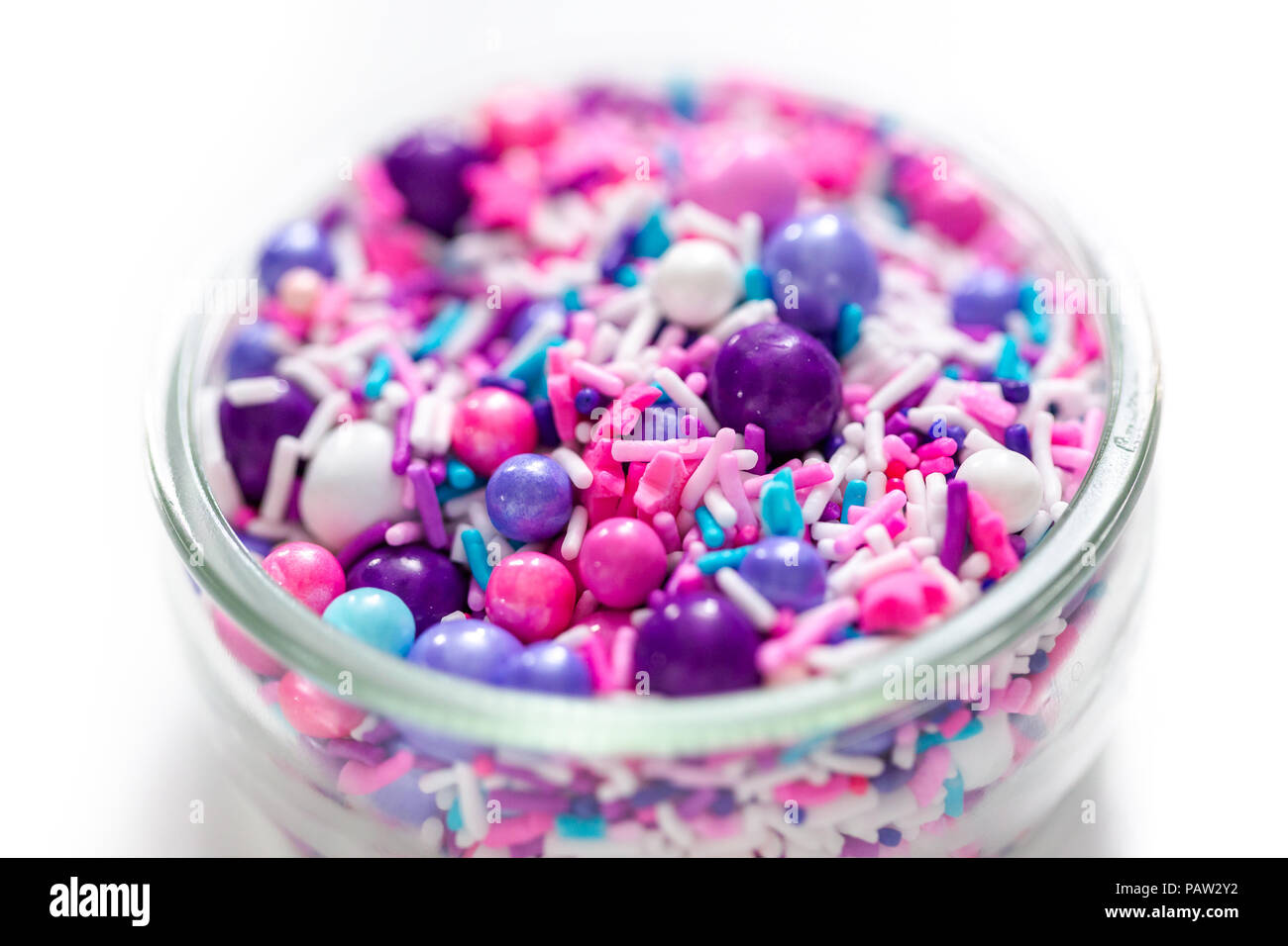 Colorful purple sprinkle blend on a white background Stock Photo - Alamy
