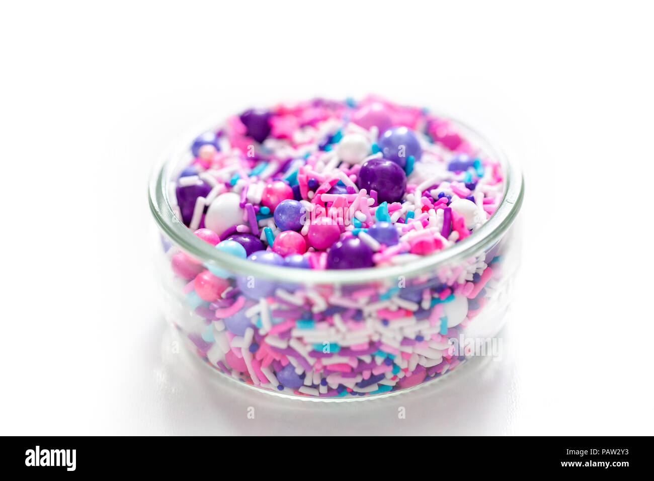 Colorful purple sprinkle blend on a white background Stock Photo - Alamy