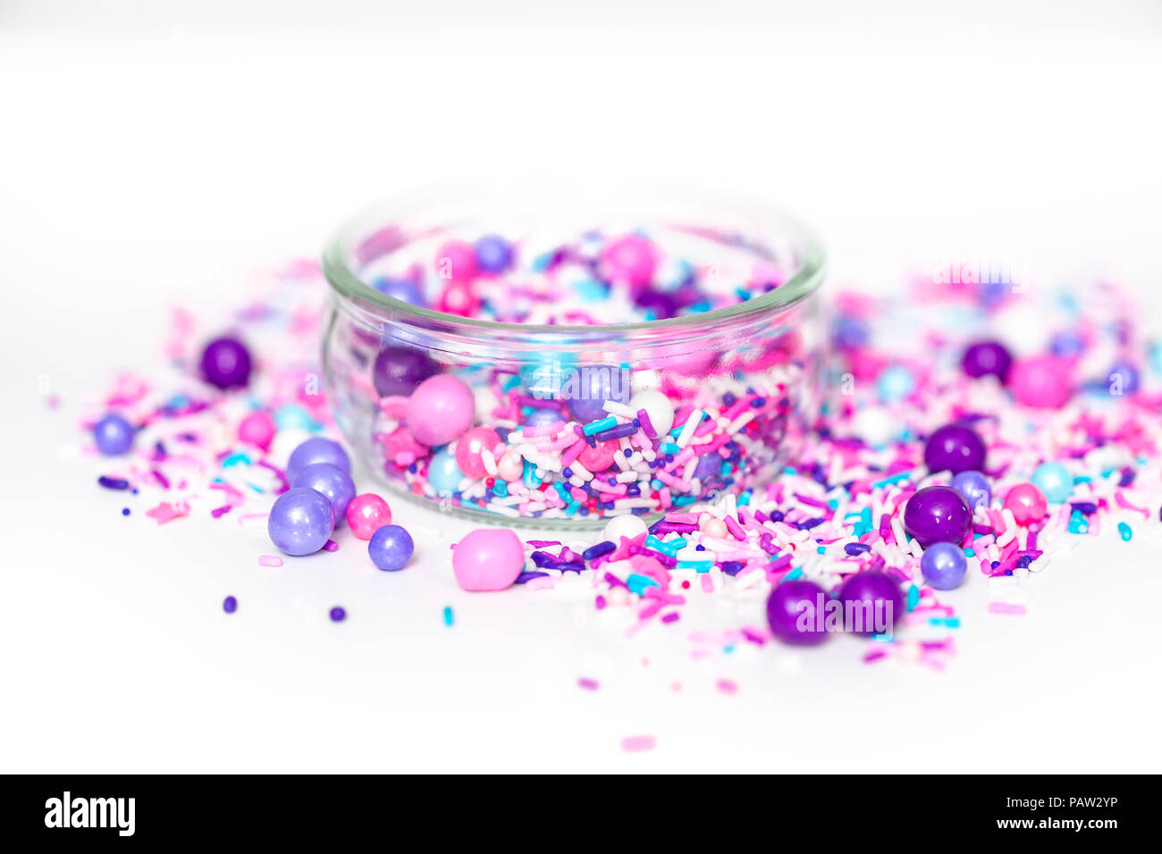 Colorful purple sprinkle blend on a white background Stock Photo - Alamy