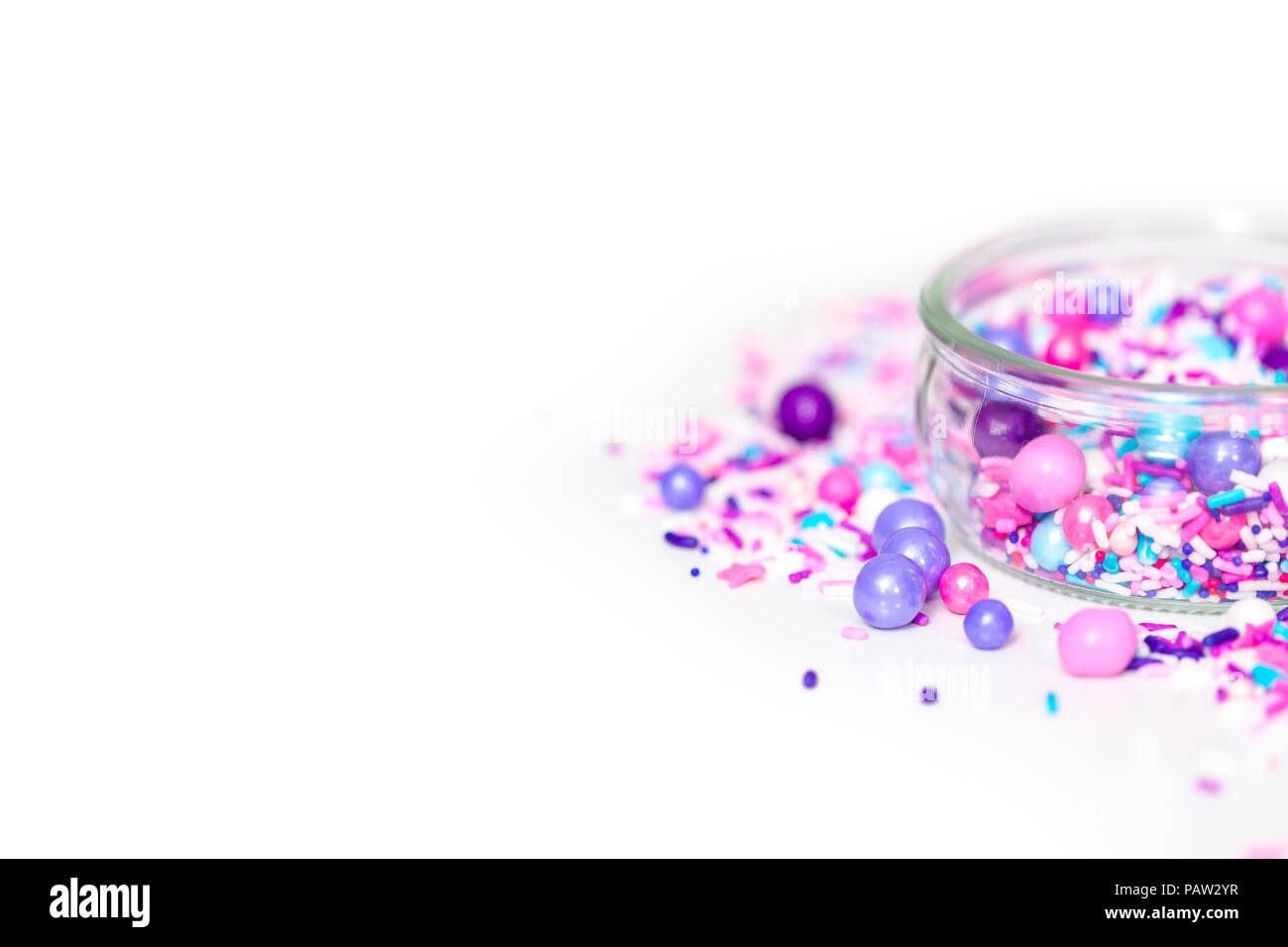 Colorful purple sprinkle blend on a white background Stock Photo - Alamy