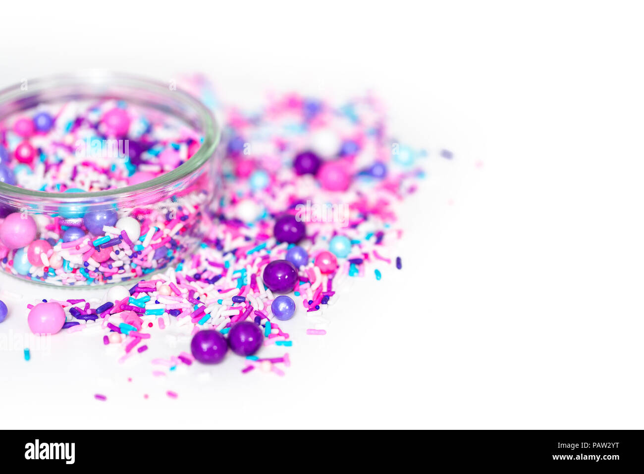 Colorful purple sprinkle blend on a white background Stock Photo - Alamy