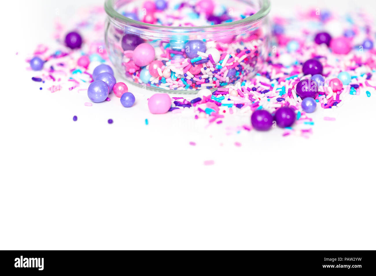 Colorful purple sprinkle blend on a white background Stock Photo - Alamy