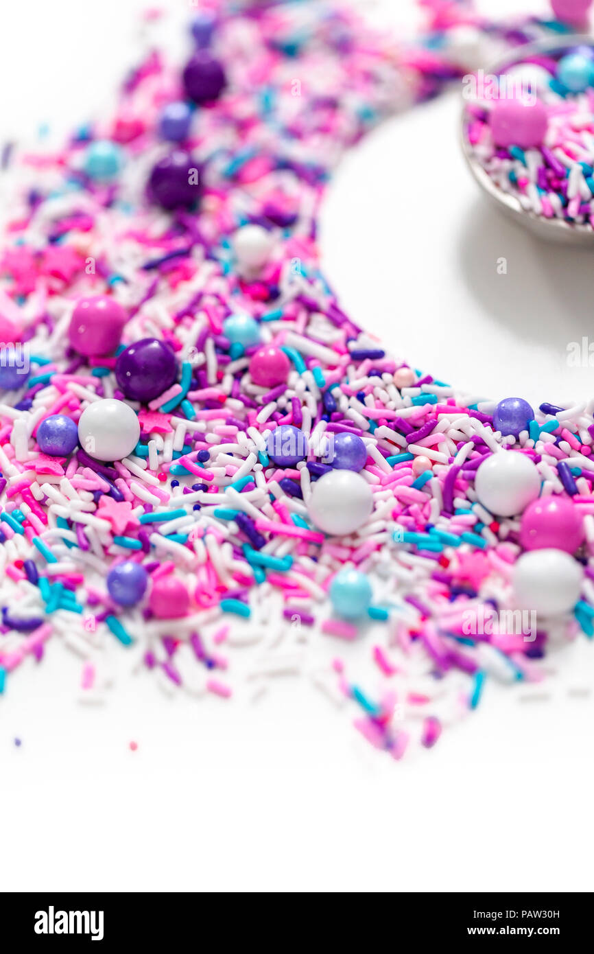 Colorful purple sprinkle blend on a white background Stock Photo - Alamy