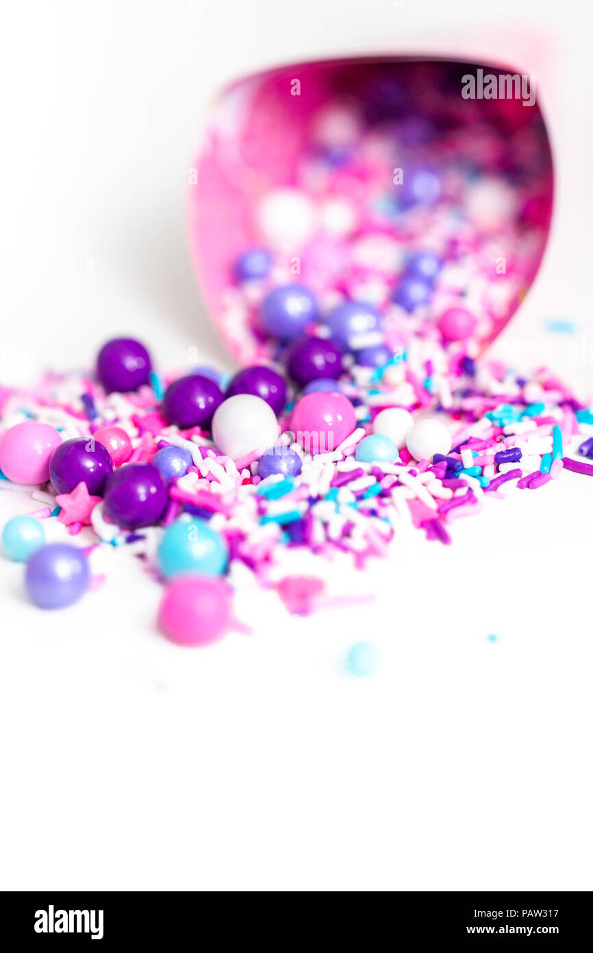 Colorful purple sprinkle blend on a white background Stock Photo - Alamy