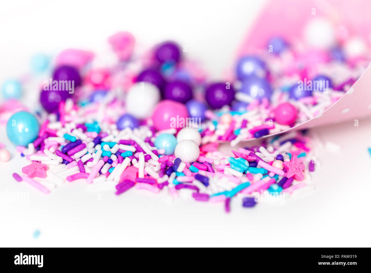 Colorful purple sprinkle blend on a white background Stock Photo - Alamy
