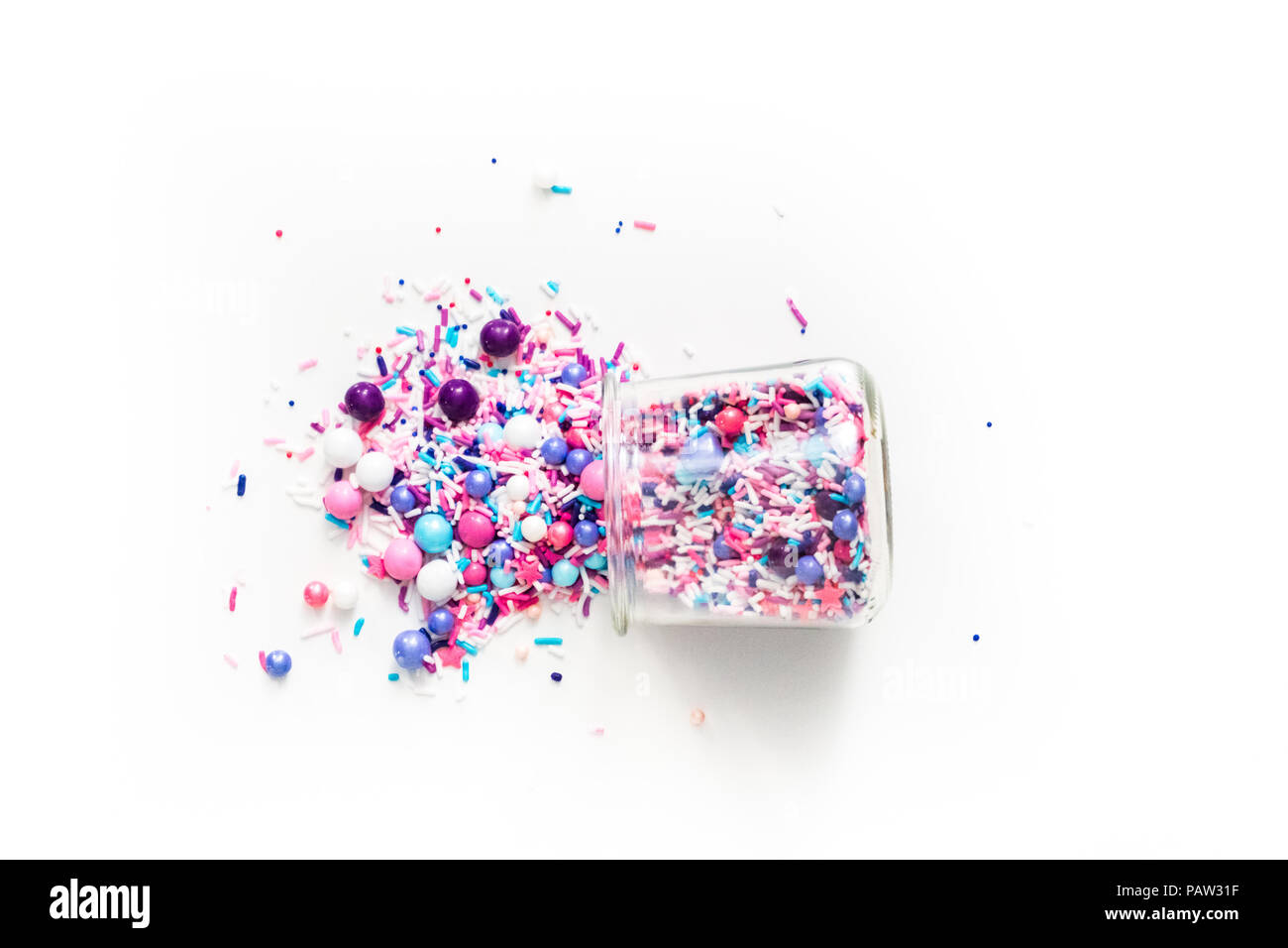 Colorful purple sprinkle blend on a white background Stock Photo - Alamy