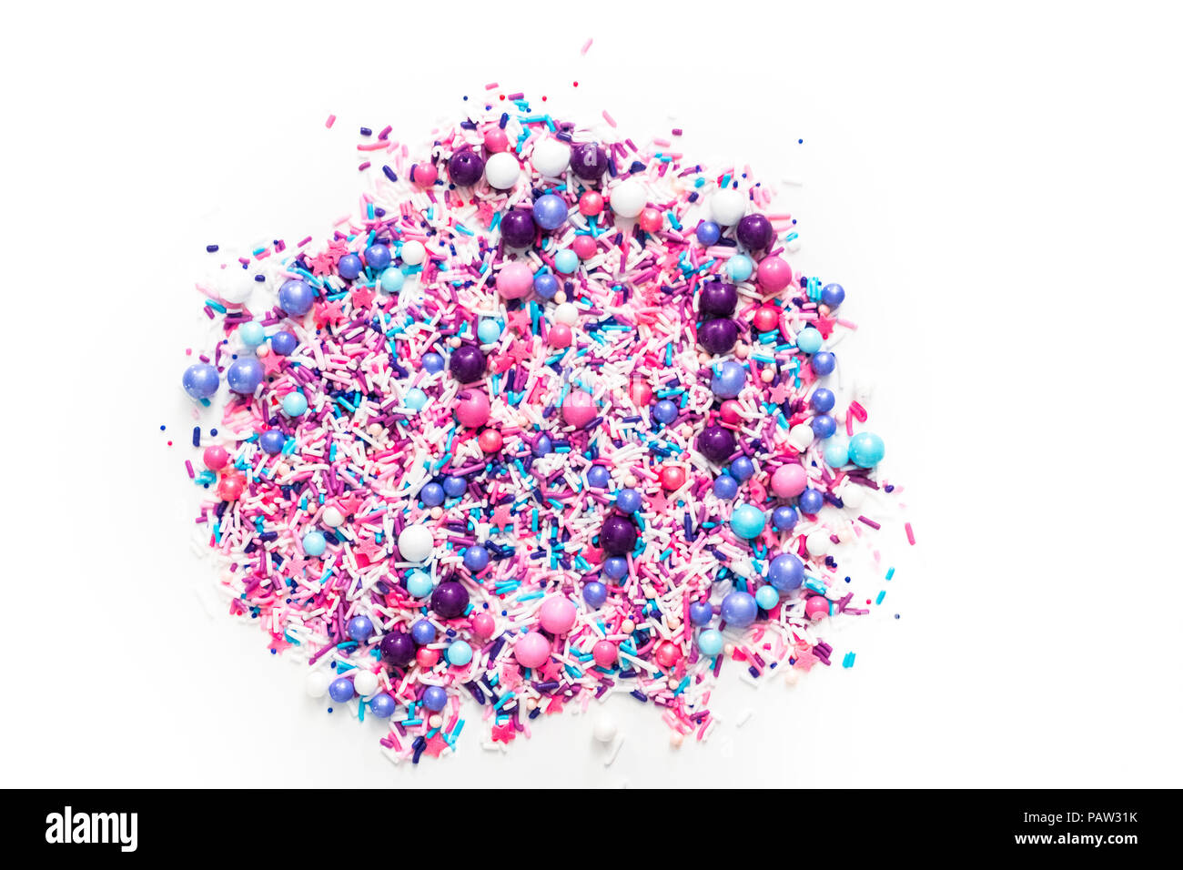Colorful purple sprinkle blend on a white background Stock Photo - Alamy