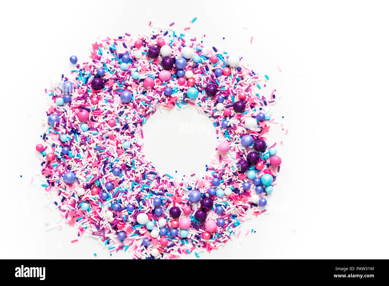 Colorful purple sprinkle blend on a white background Stock Photo - Alamy