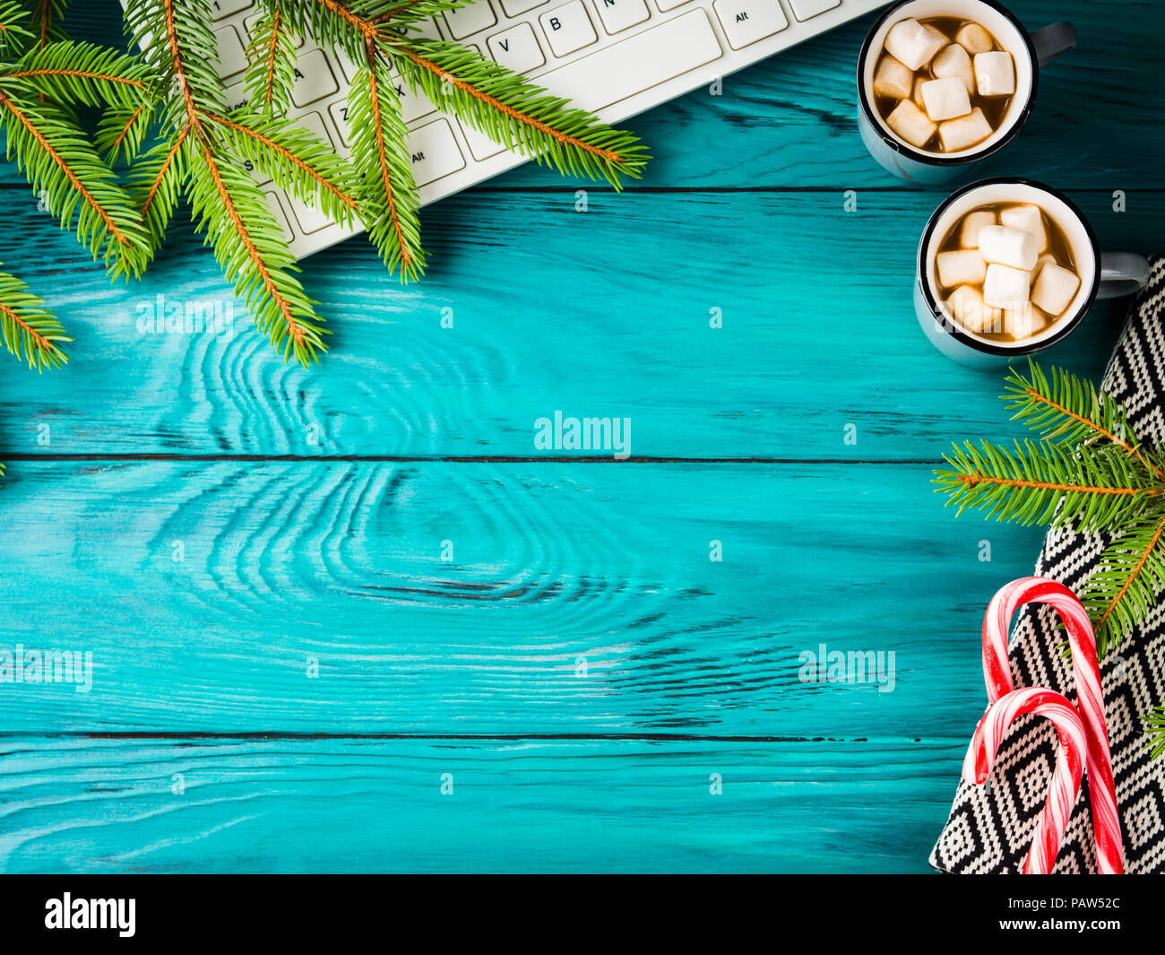 Winter christmas green background with hot chocolate, green branch and ...