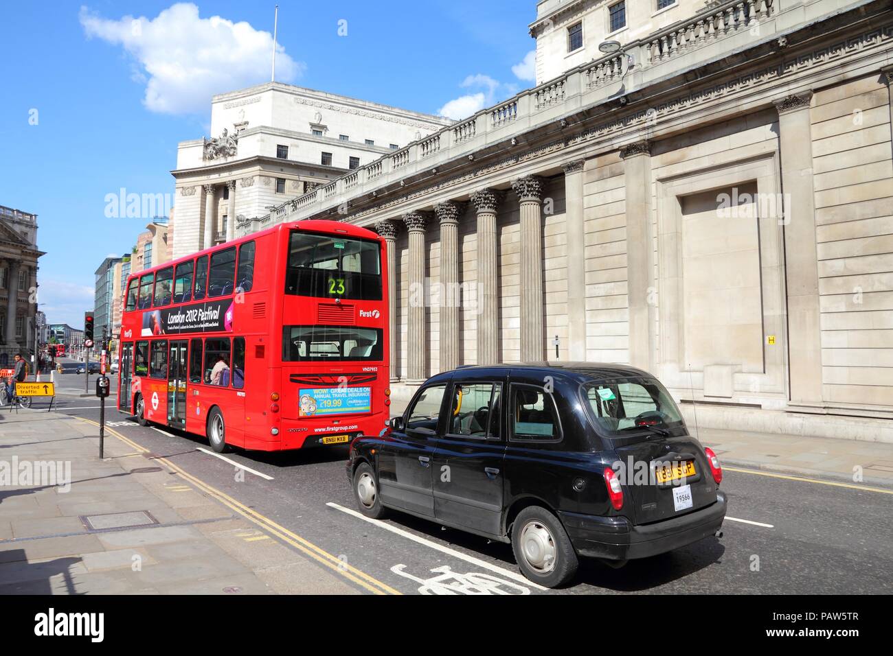 LONDON - MAY 13: People ride London Bus on May 13, 2012 in London. As ...