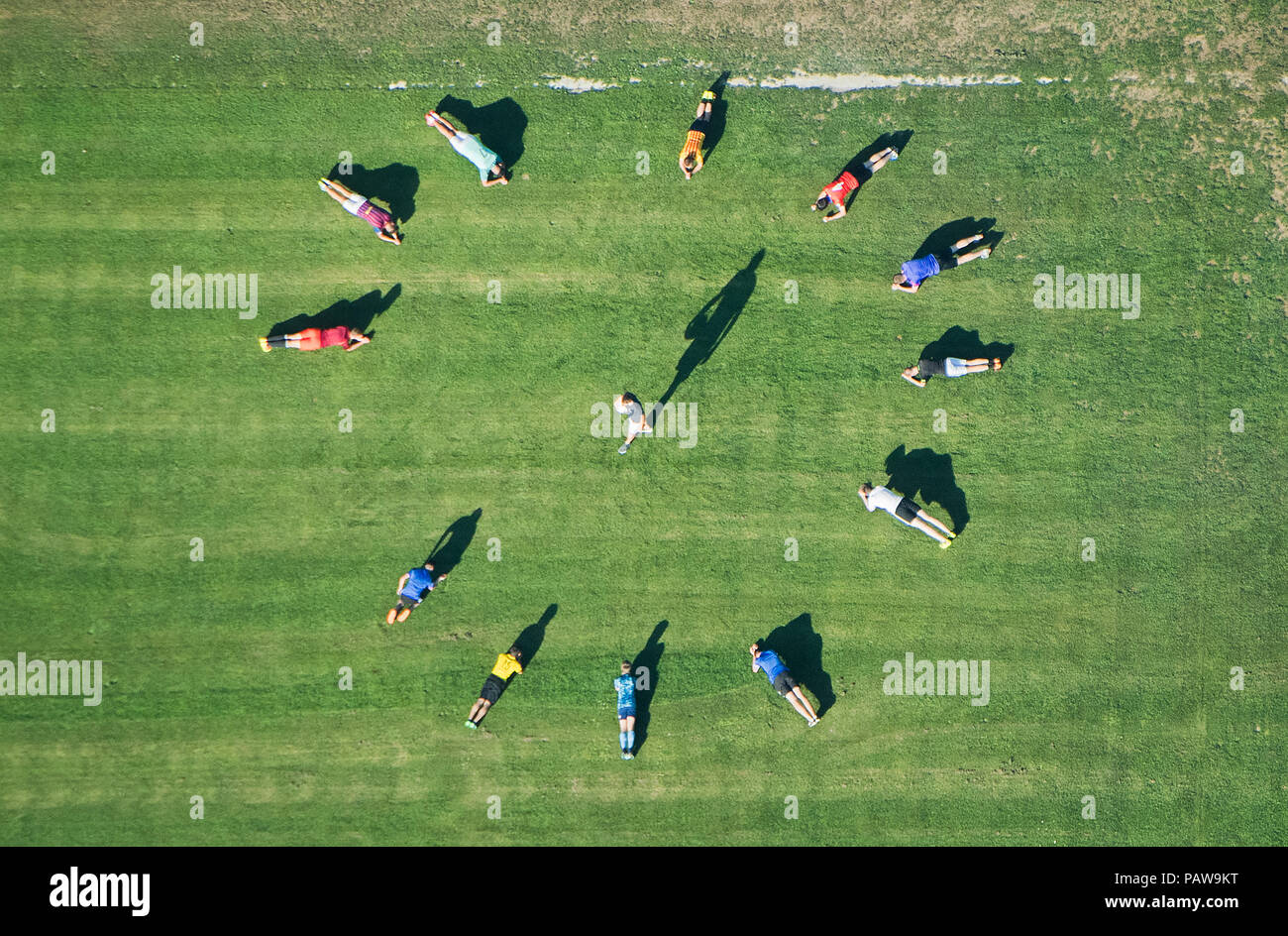 Germany, Laatzen. 24th July, 2017. Twelve footballers and their trainer ...